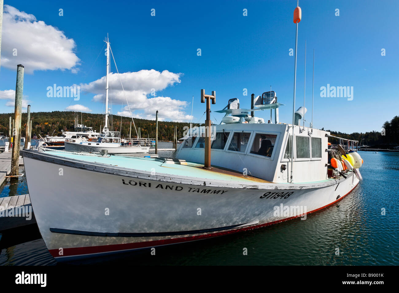 Fishing boat in harbor Stock Photo - Alamy