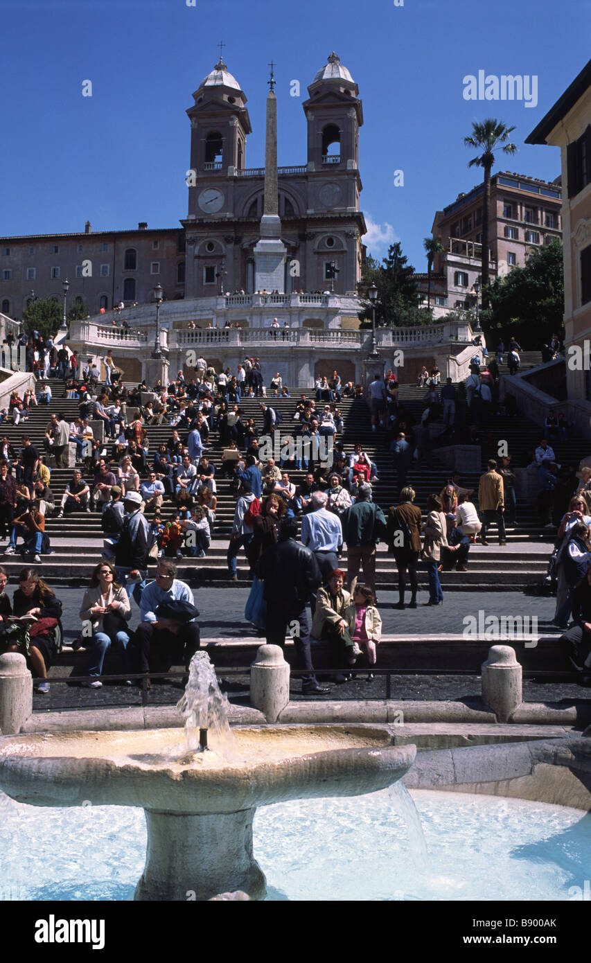 The crowded and popular Spanish Steps in Rome Italy with the Trinita ...