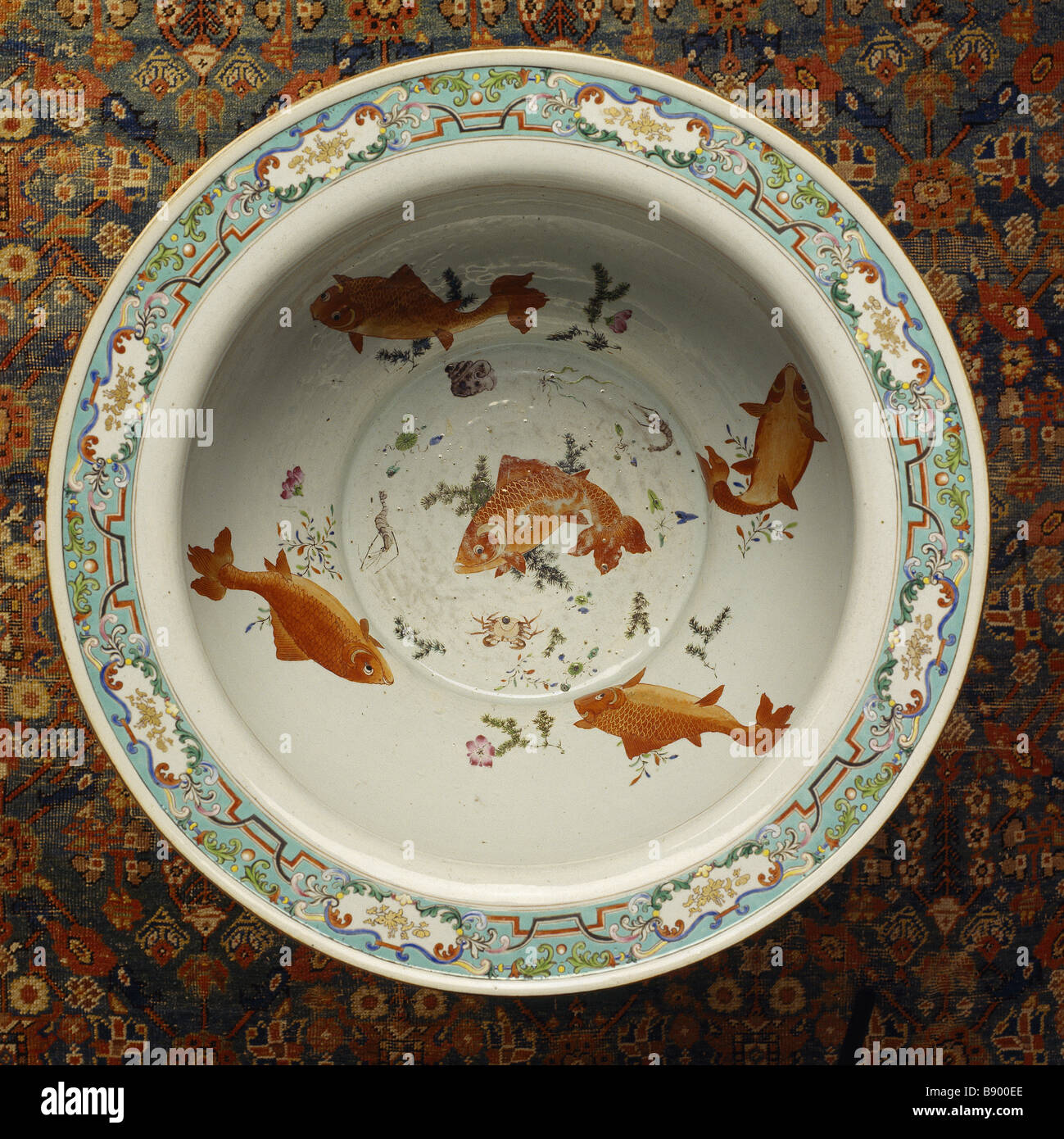 A ceramic dish with goldfish painted on the inside at Wallington ...