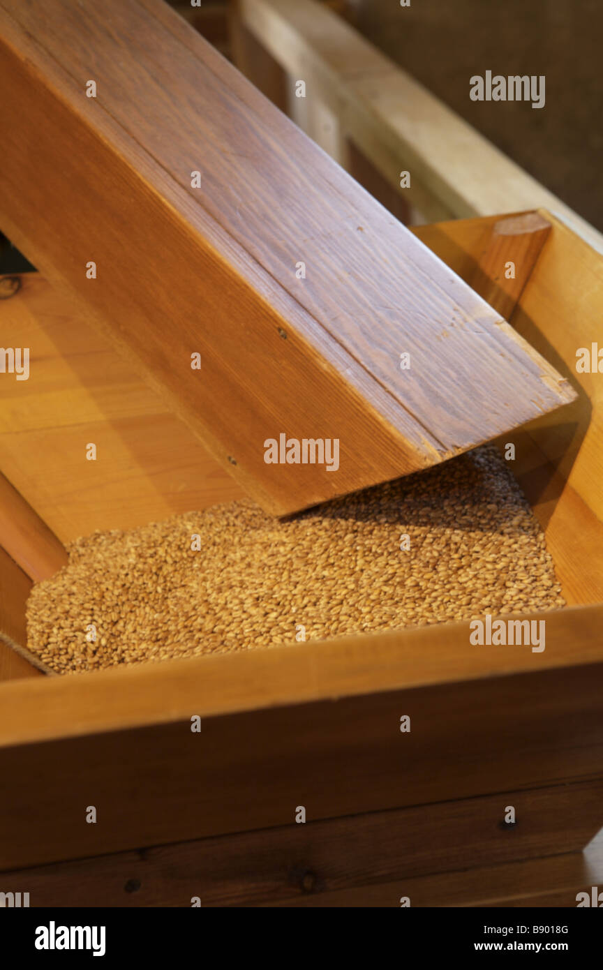 Wheat in the storage hopper which feeds the grinding stone at C18th ...