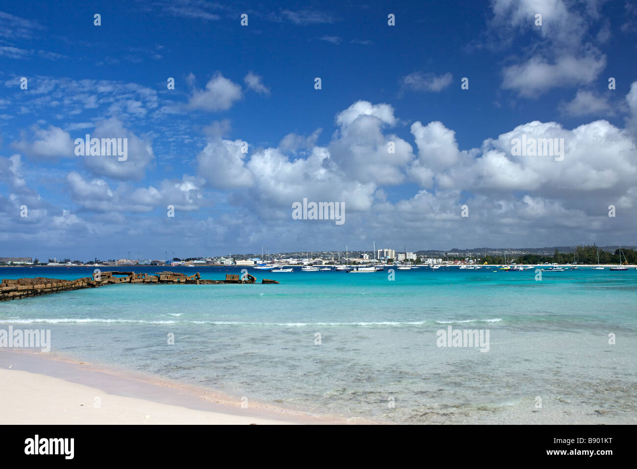 Old wooden wharf at Pebbles Beach at West Coast of Barbados, "West ...