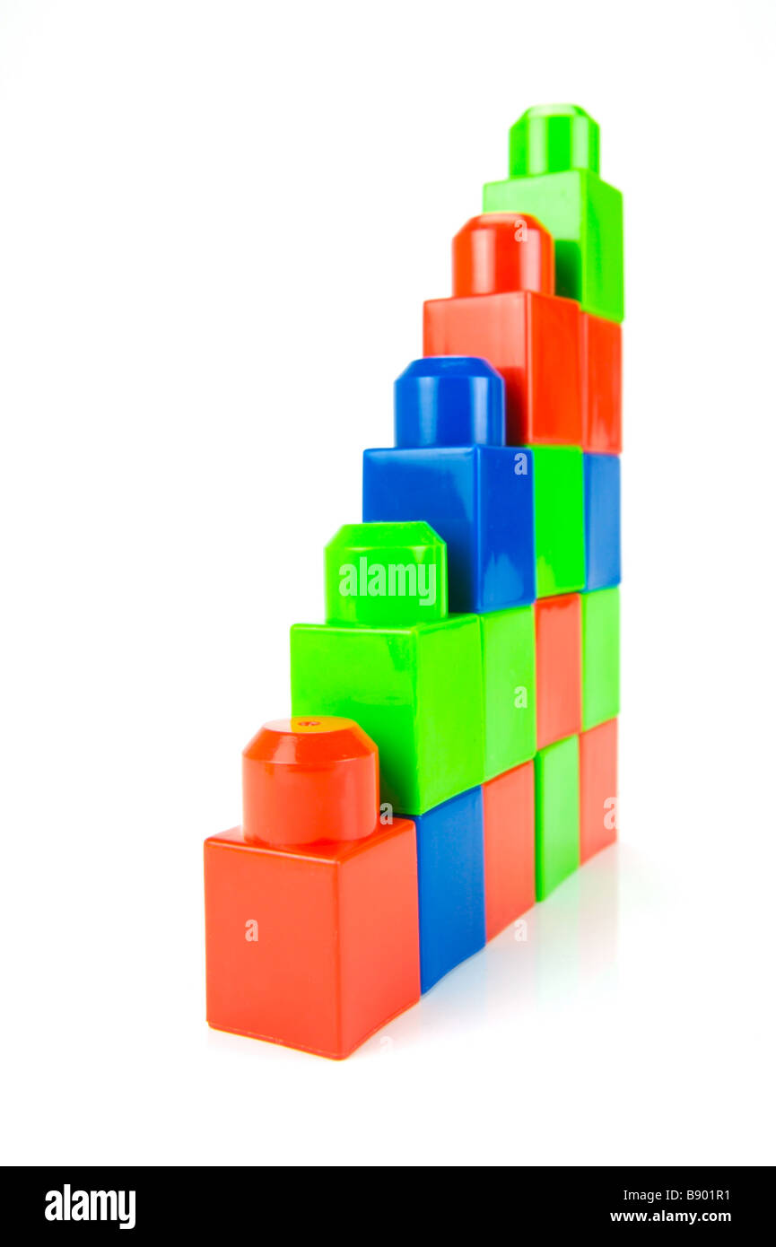 Building blocks isolated against a white background Stock Photo - Alamy