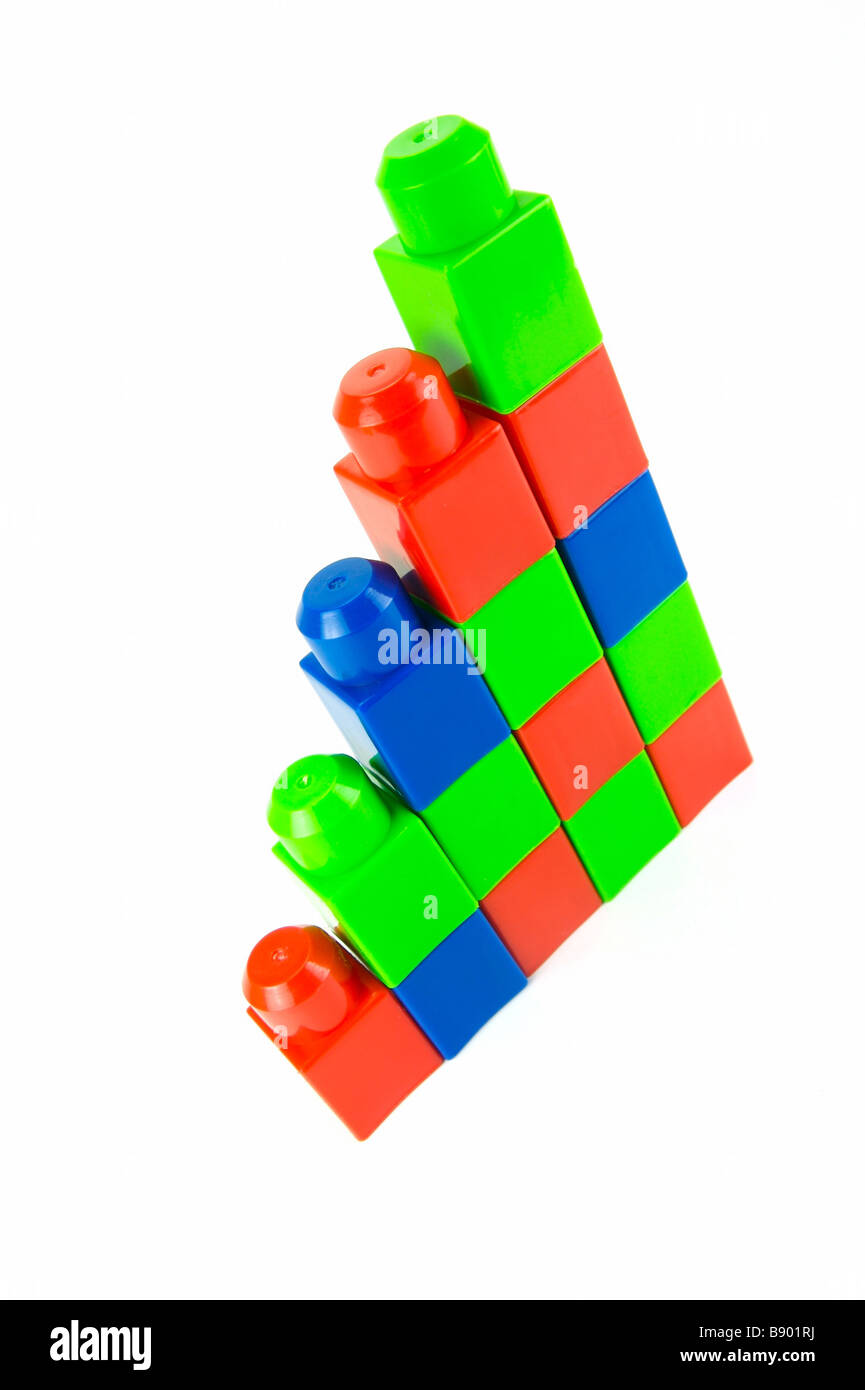 Building blocks isolated against a white background Stock Photo - Alamy