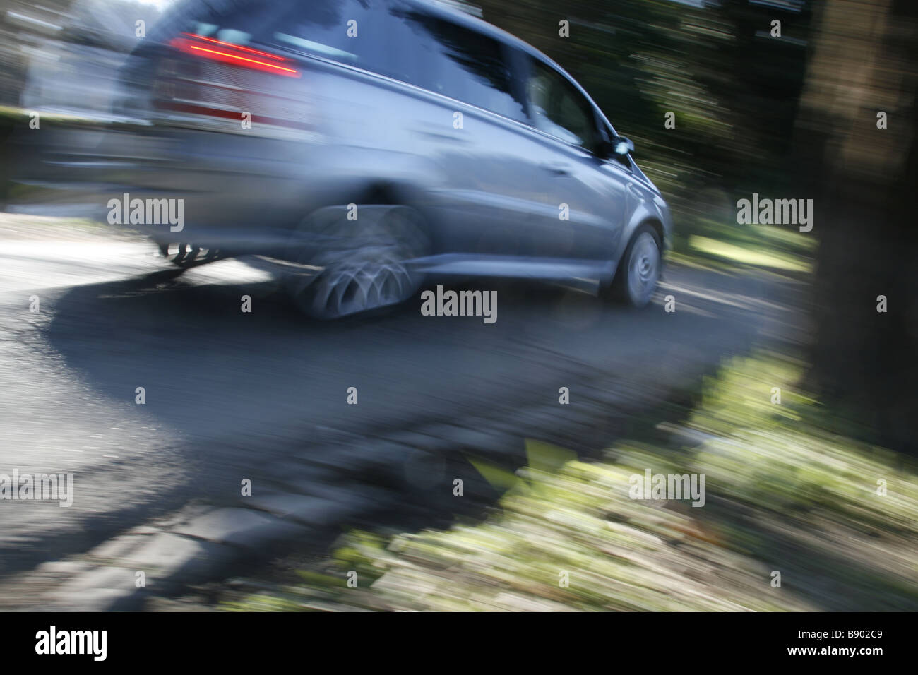 one fast car in motion action on rural country street lane Stock Photo ...
