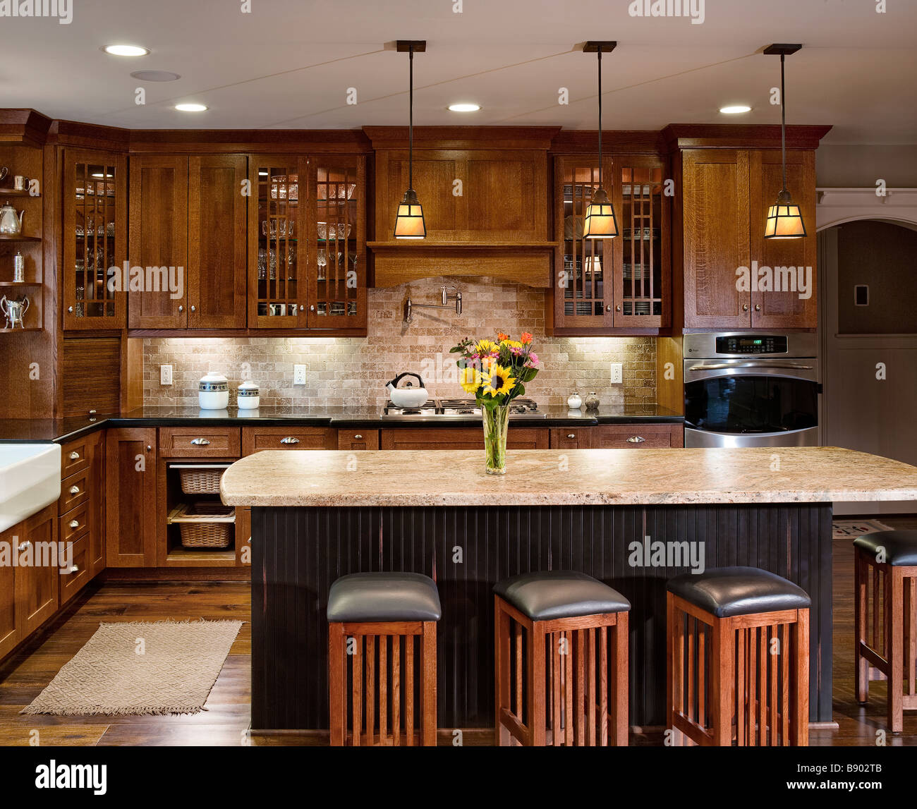 Contemporary kitchen with wooden cabinets Stock Photo - Alamy