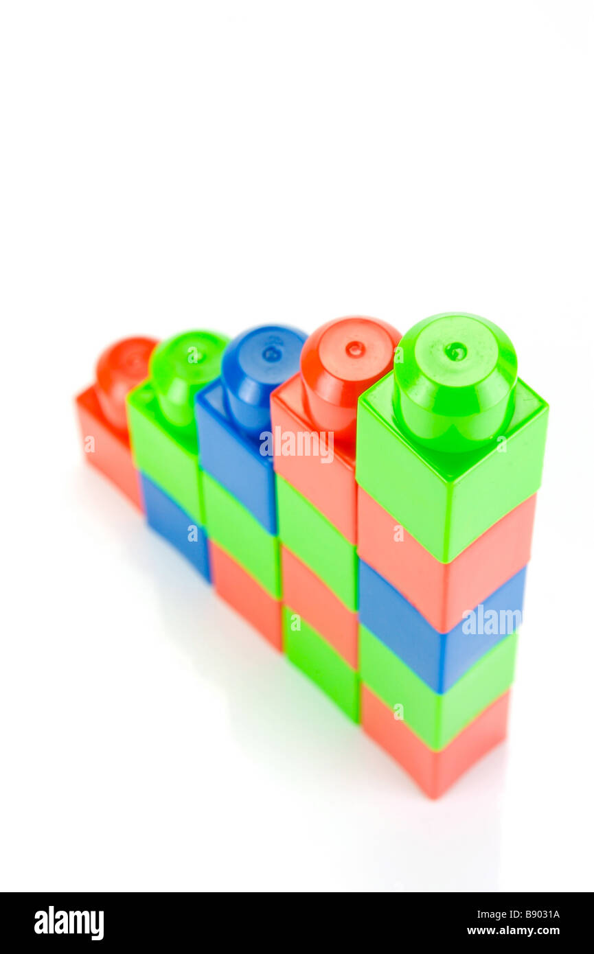Building blocks isolated against a white background Stock Photo - Alamy