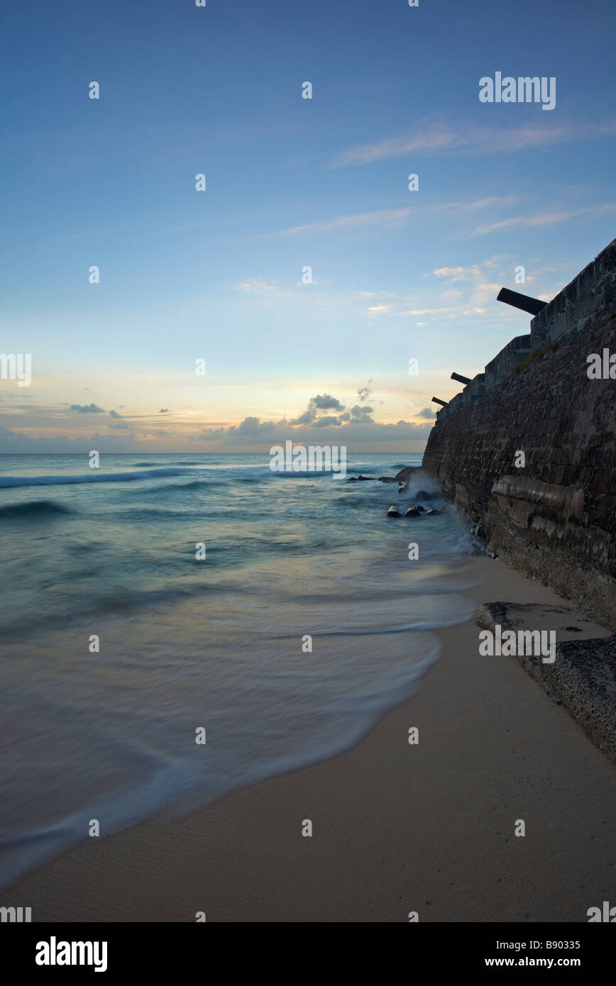 Cannons from World War I and sunset sky above Needham's Point, Barbados ...