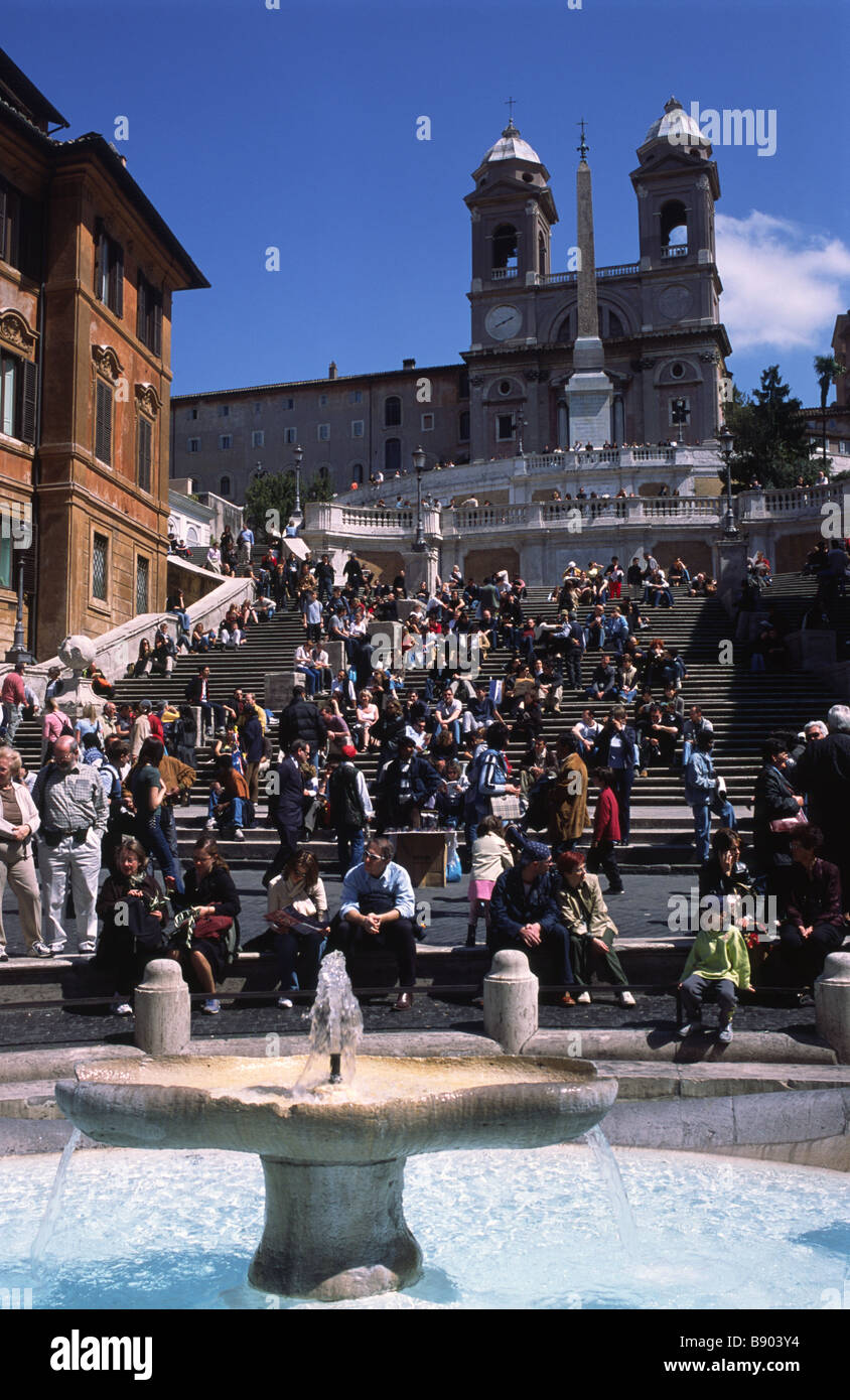 The crowded and popular Spanish Steps in Rome Italy with the Trinita ...