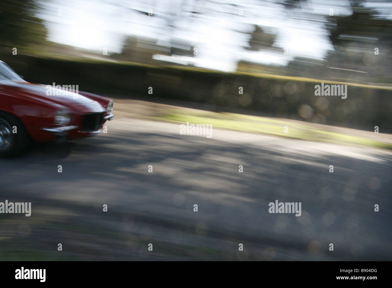 one fast car in motion action on rural country street lane Stock Photo ...