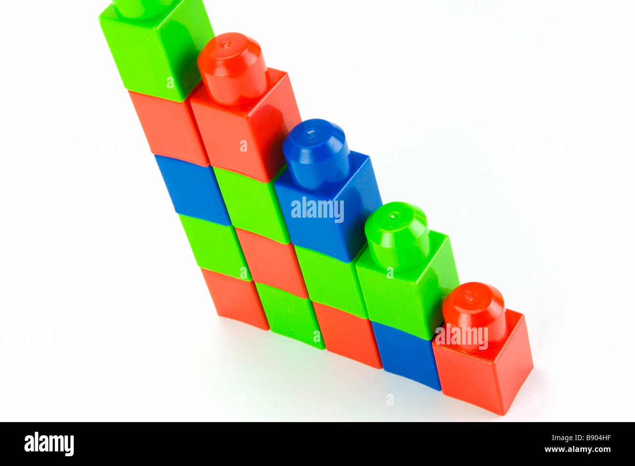 Building blocks isolated against a white background Stock Photo - Alamy