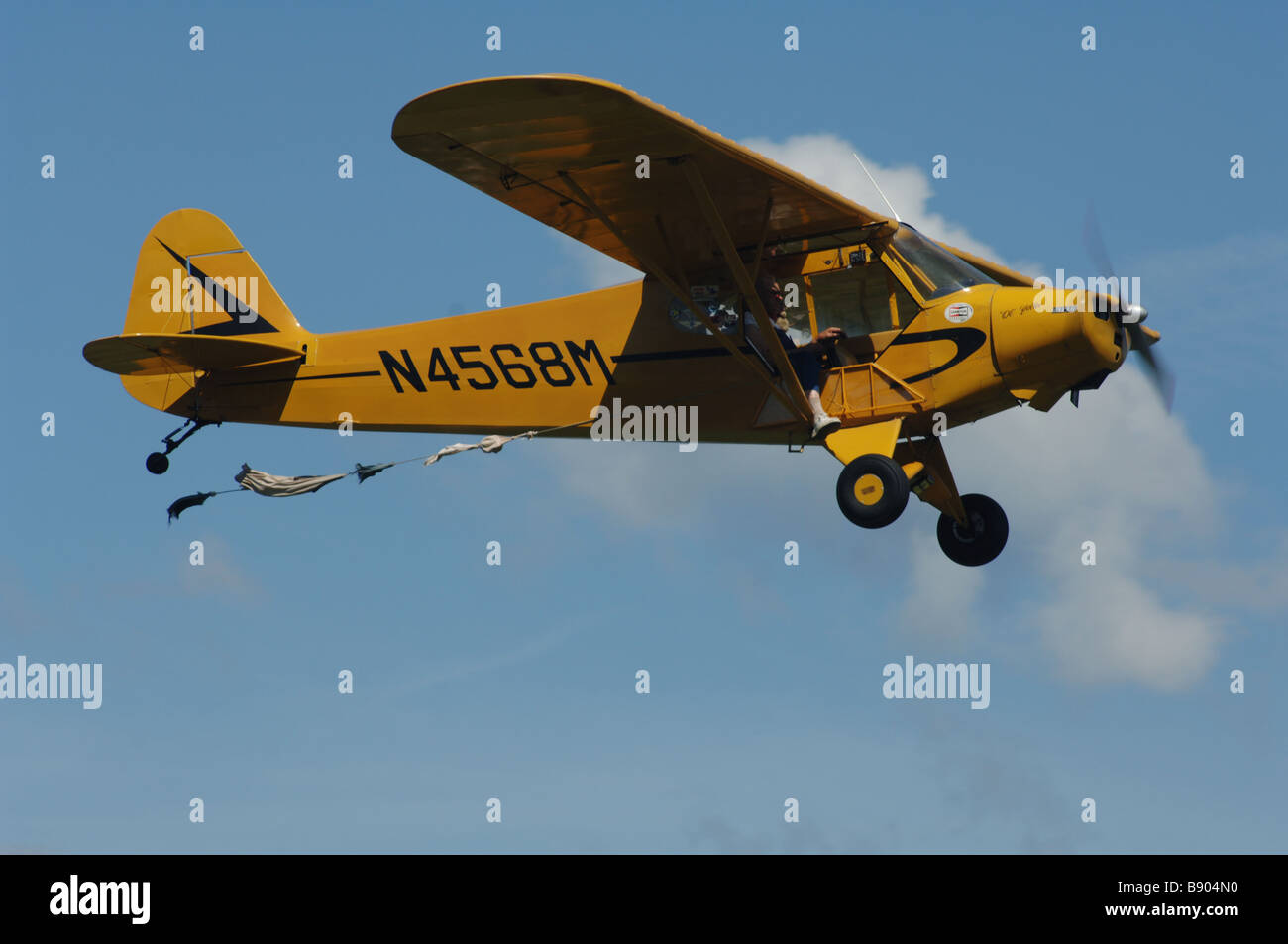 Stunt pilot flying Piper cub at historic Rhinebeck Aerodrome, Hudson ...