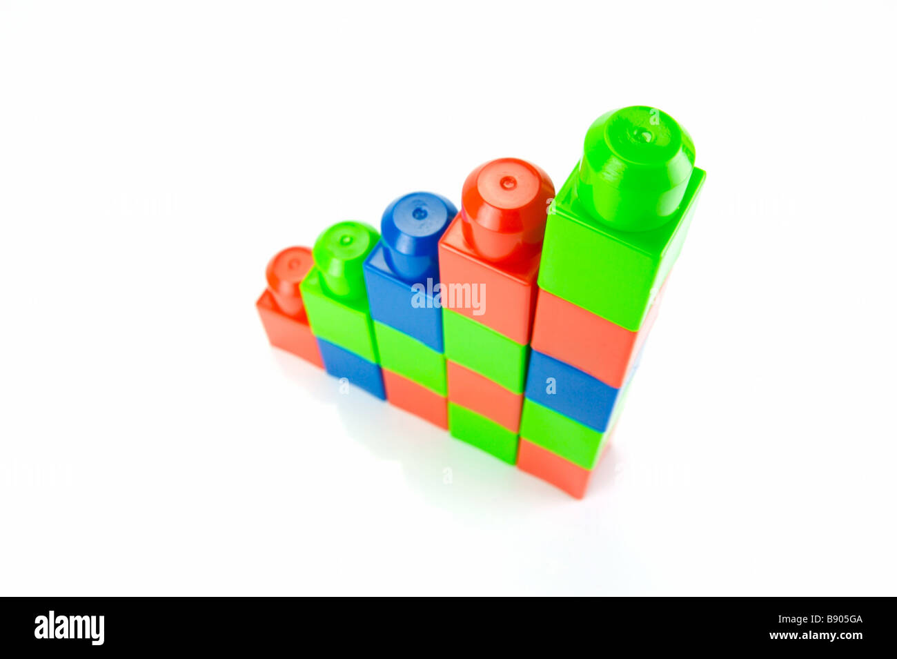 Building blocks isolated against a white background Stock Photo - Alamy