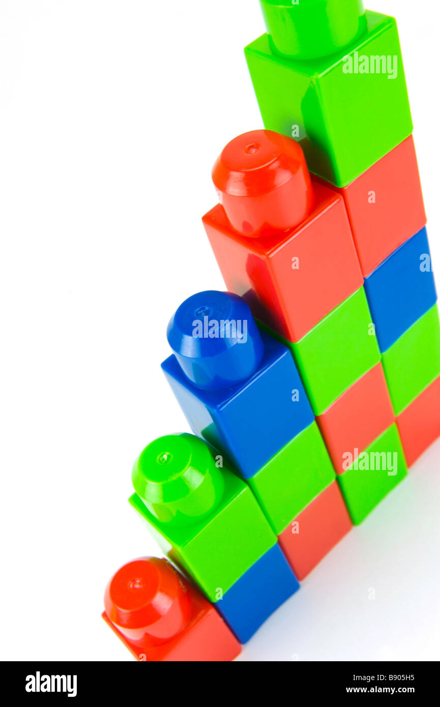 Building blocks isolated against a white background Stock Photo - Alamy
