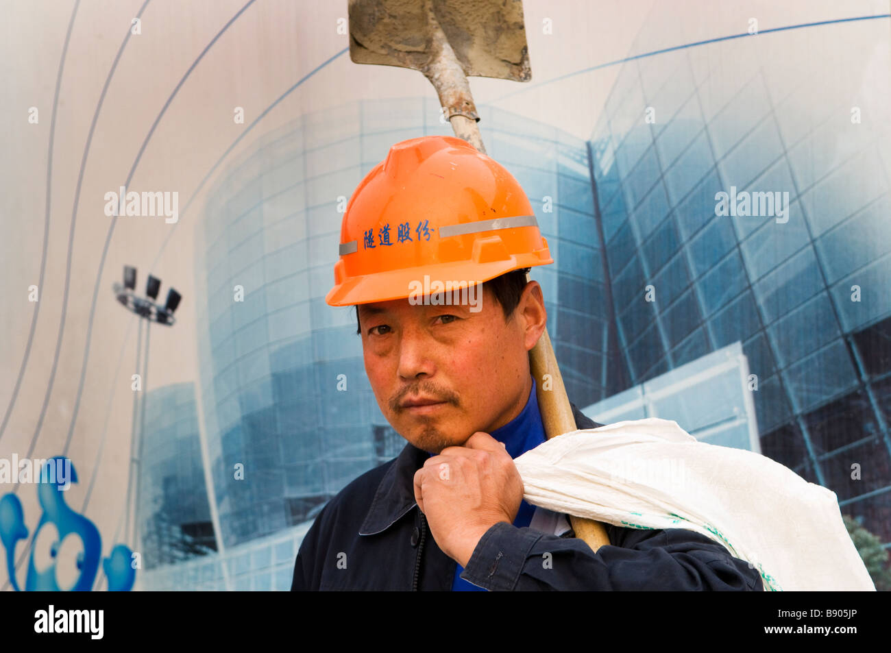 Portrait of a Chinese construction worker at the construction site of ...