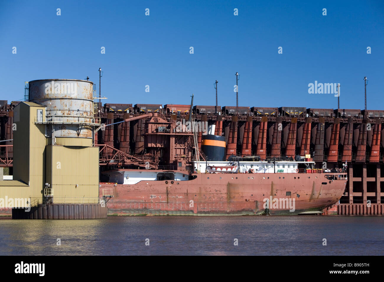 Ship unloading coal at a power station Stock Photo - Alamy