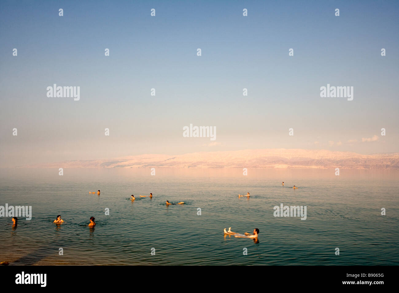 Tourists wading and floating in Dead Sea, Israel, Middle East Stock ...