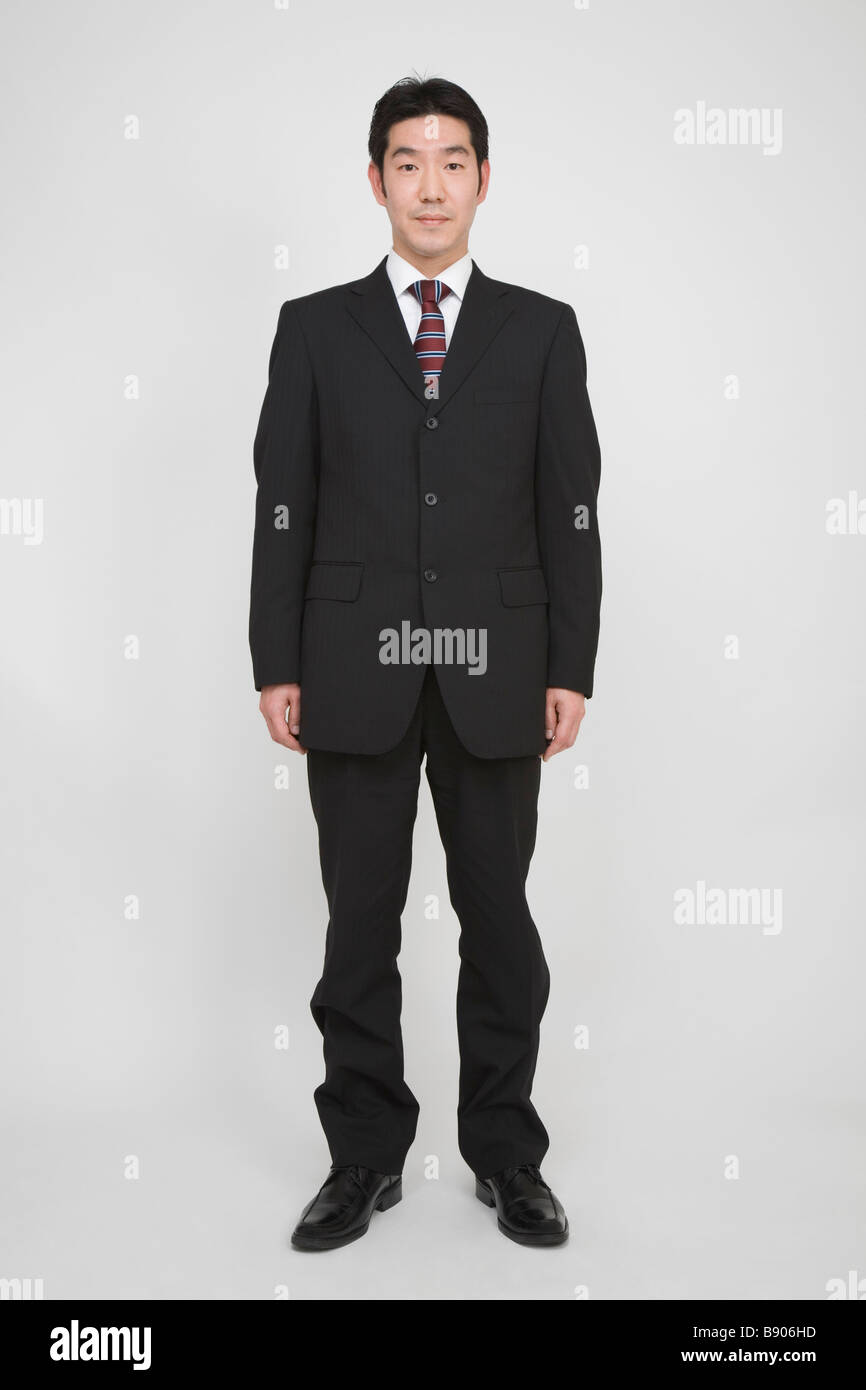 Portrait of a mid adult man standing Stock Photo - Alamy