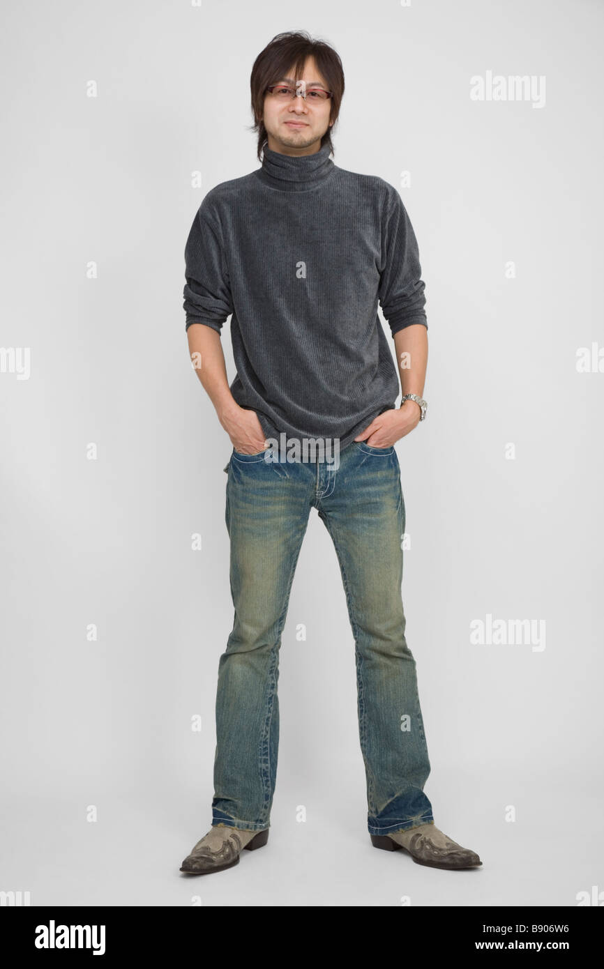 Portrait of a mid adult man standing Stock Photo - Alamy