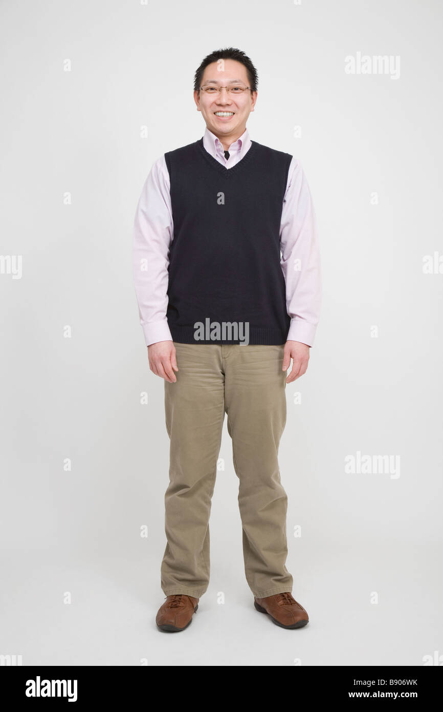 Portrait of a mid adult man standing Stock Photo - Alamy