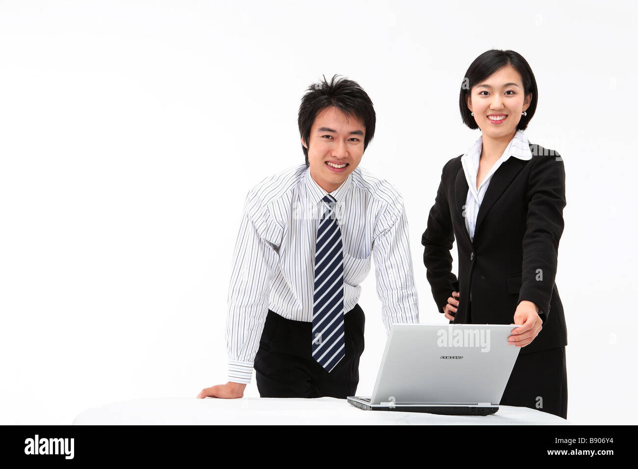 Young Business Couple Stock Photo - Alamy