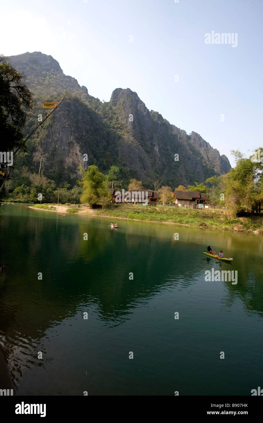 Laos, Vientiane Province, Vang Vieng, Nam Song River. Limestone hills ...
