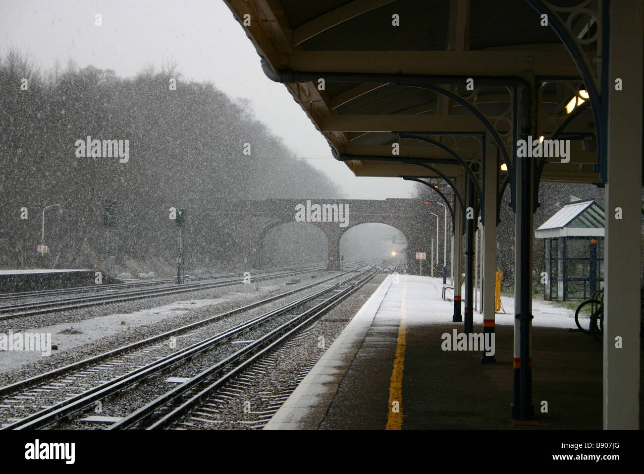 Snowy train station in England Stock Photo - Alamy