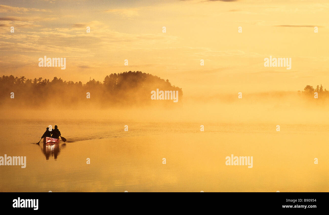 Couple row boat mist hi-res stock photography and images - Alamy