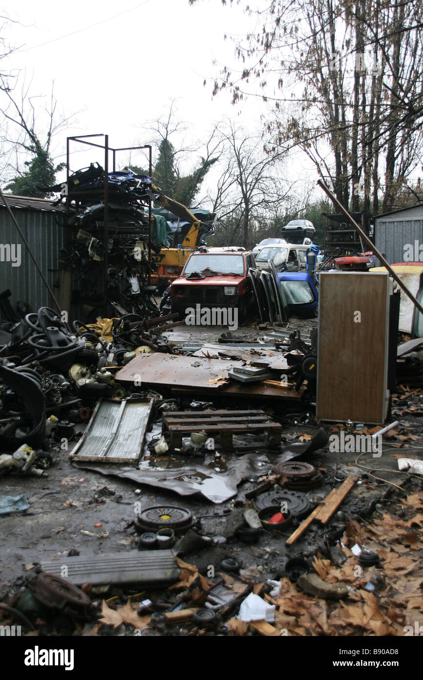 piled up spare parts and cars in breakers scrap yard Stock Photo - Alamy