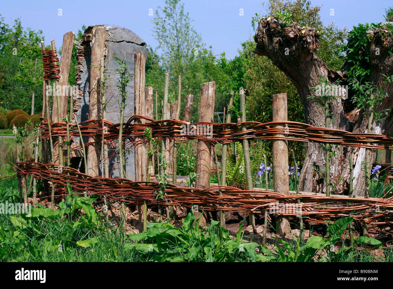Fence with willow stakes Stock Photo - Alamy