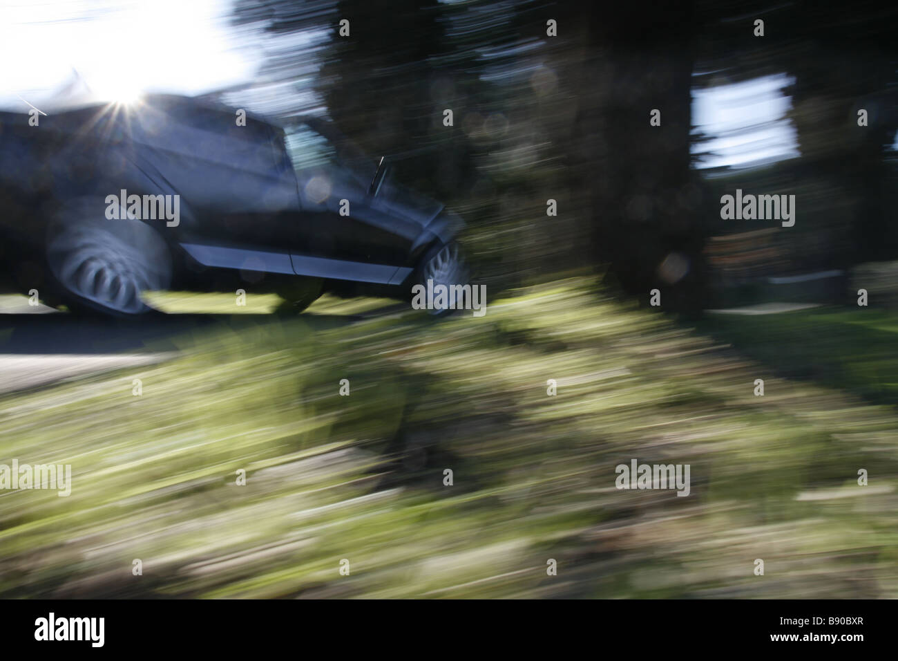 one fast car in motion action on rural country street lane Stock Photo ...