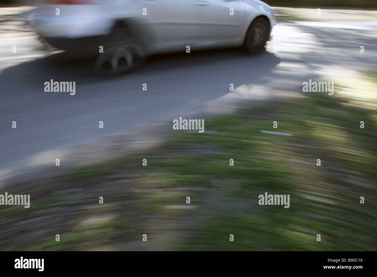 one fast car in motion action on rural country street lane Stock Photo ...