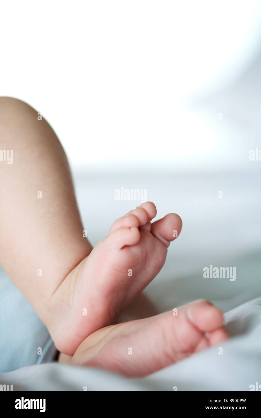 Baby feet close-up Stock Photo - Alamy