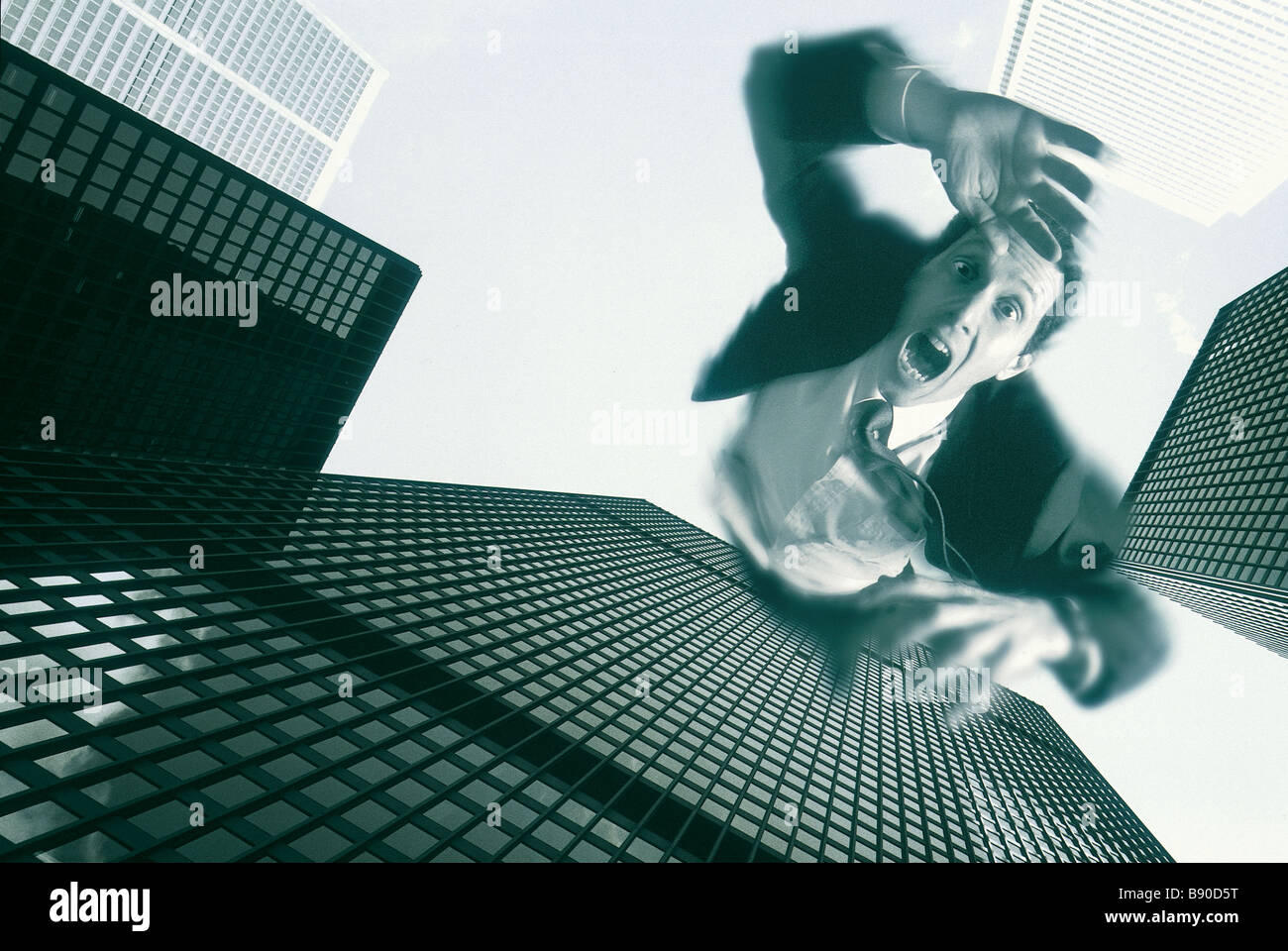 Businessman falling from building hi-res stock photography and images ...