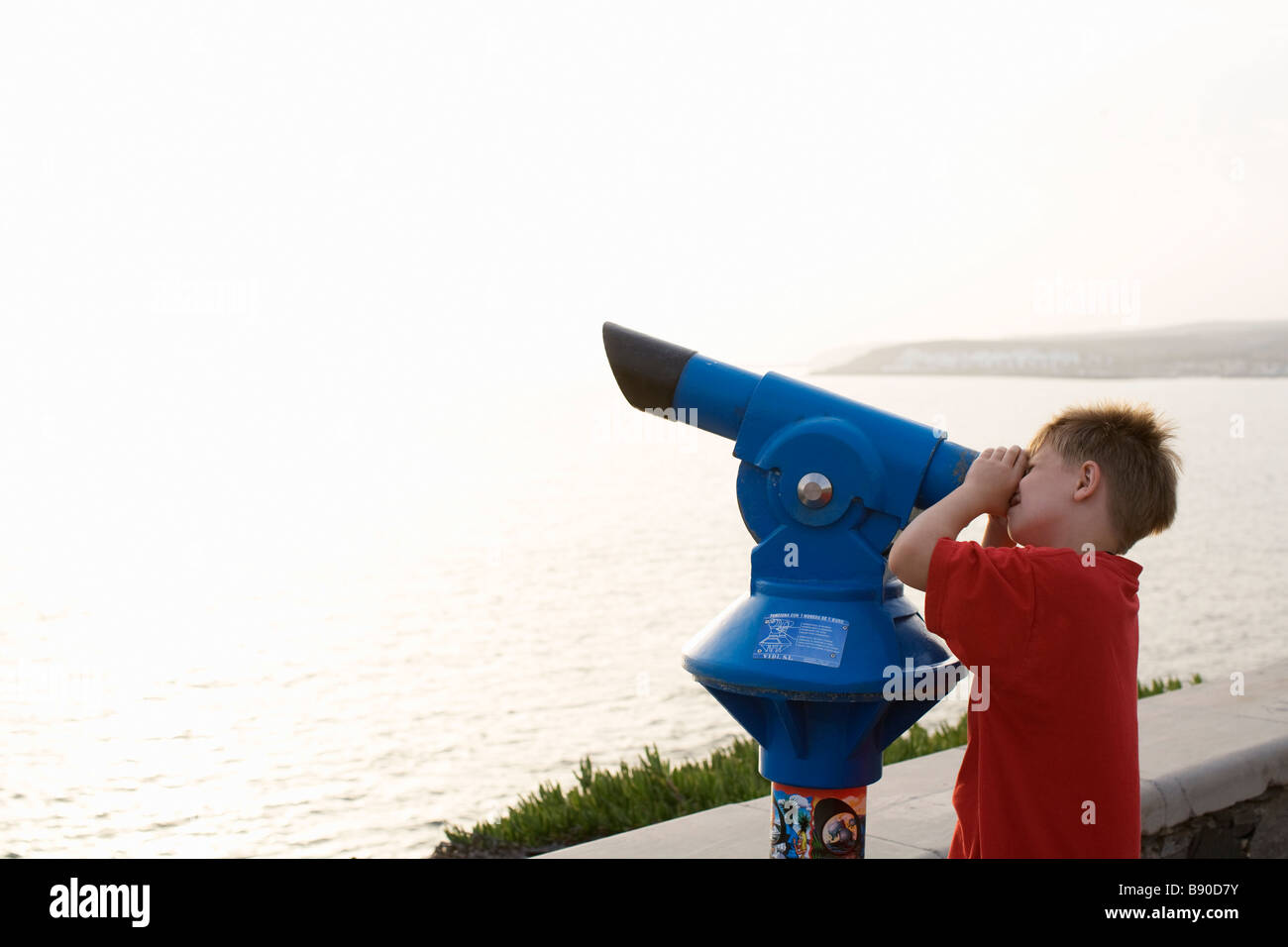 Boy Using Telescope High Resolution Stock Photography and Images - Alamy