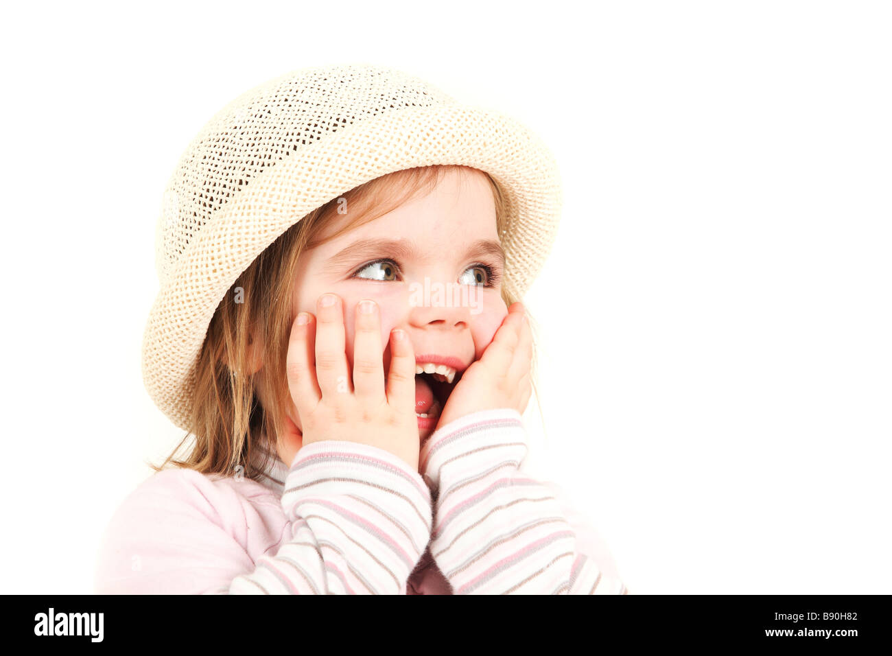 Portrait of young shocked girl laughing, studio shot Stock Photo - Alamy