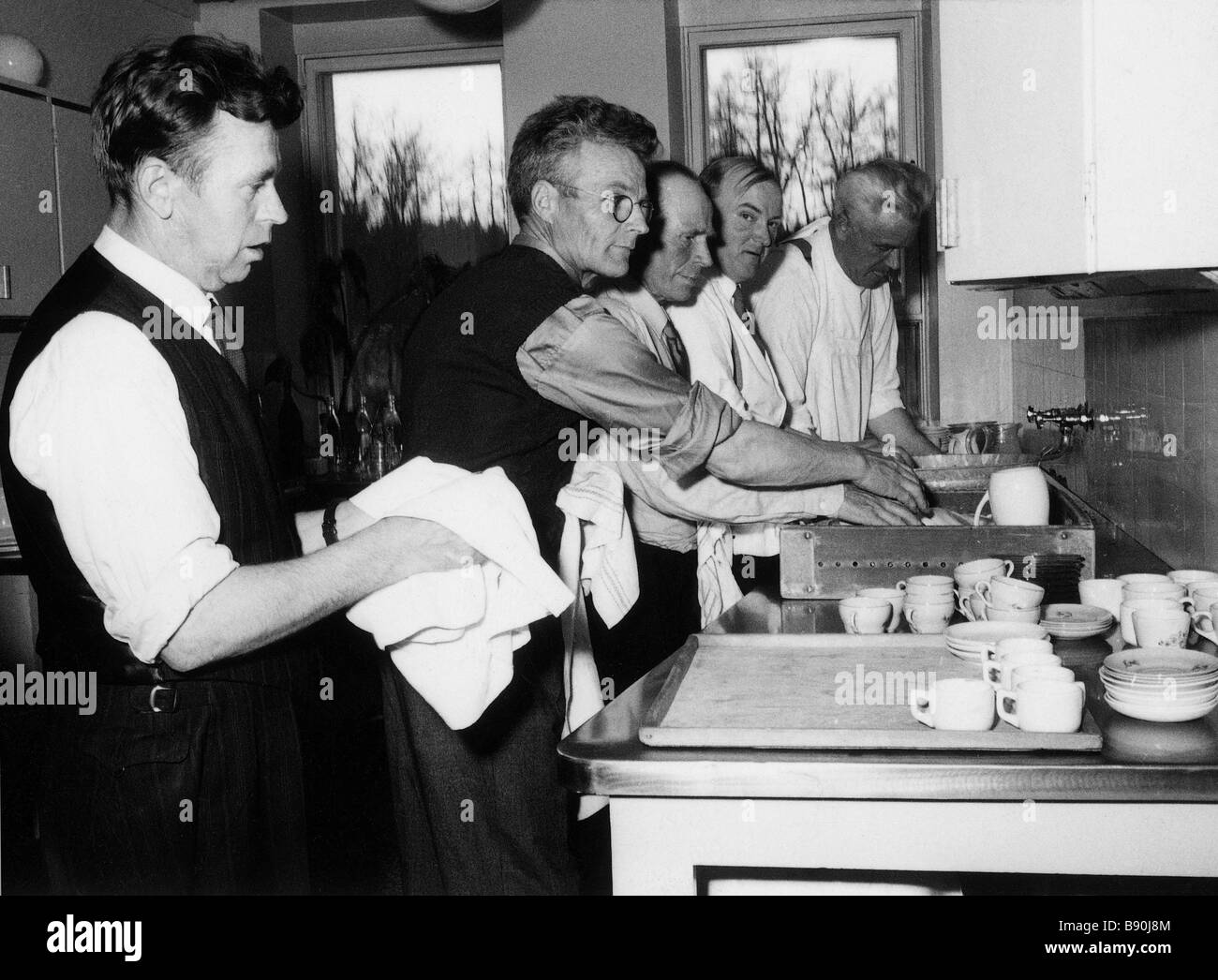 Men washing Black and White Stock Photos & Images - Alamy