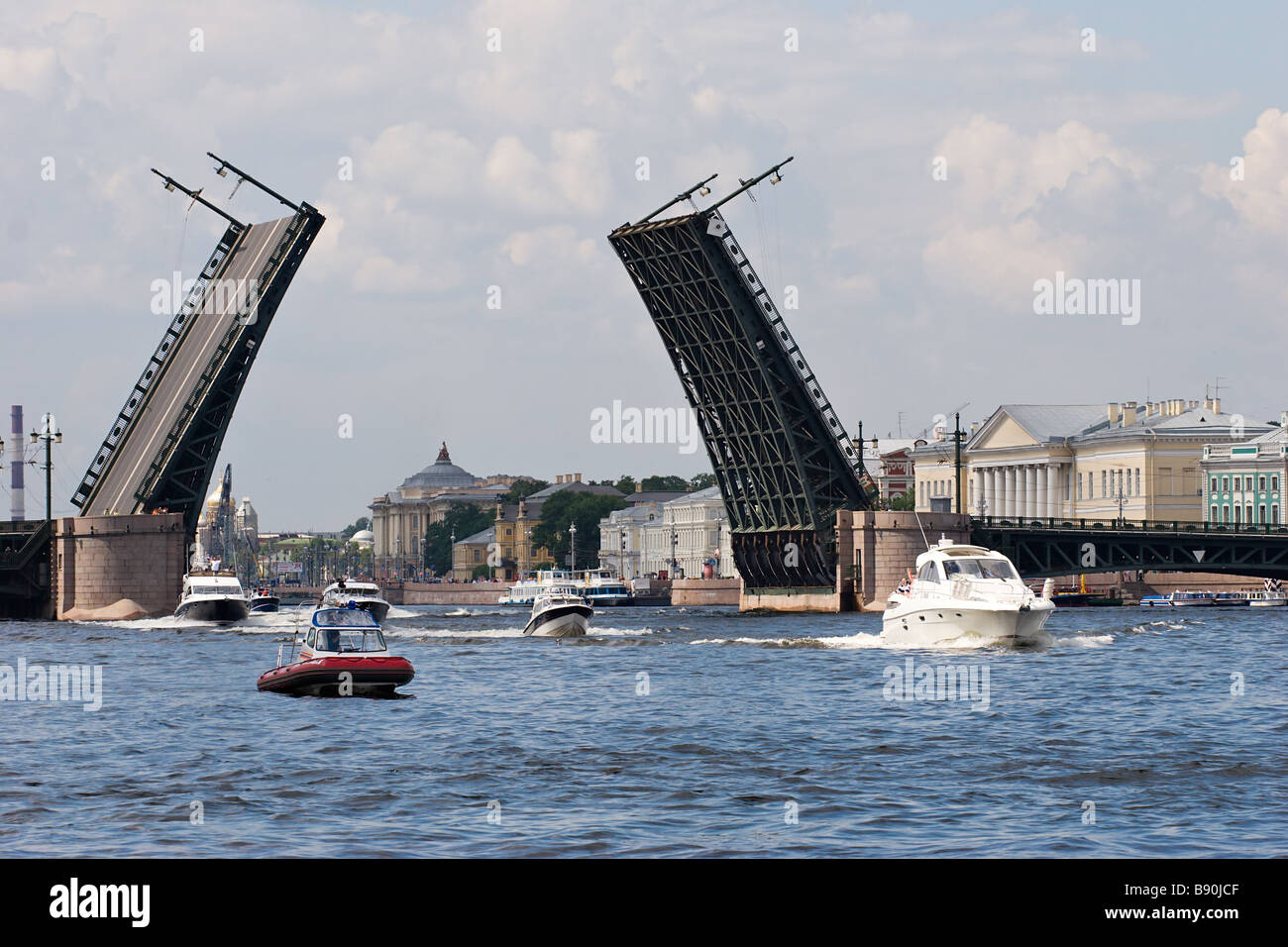 motor boats under drawbridge in river show Saint Petersburg Russia ...