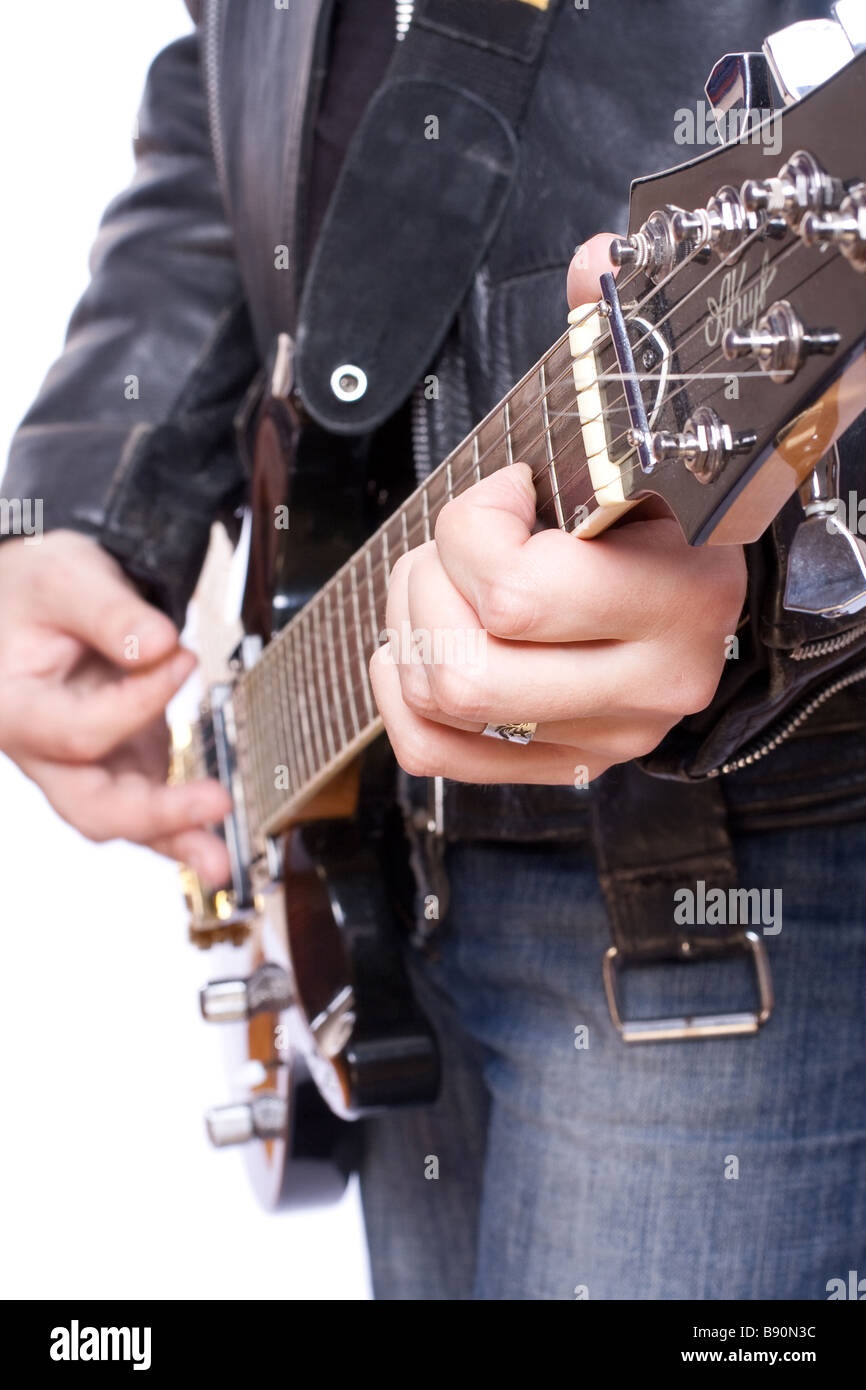 Young man plays electric guitar hi-res stock photography and images - Alamy