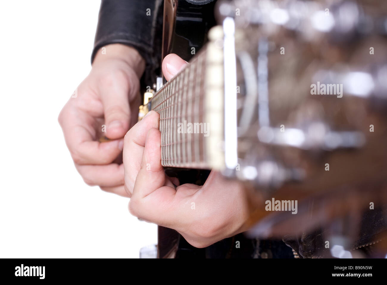 one man plays the guitar on a white background Stock Photo - Alamy
