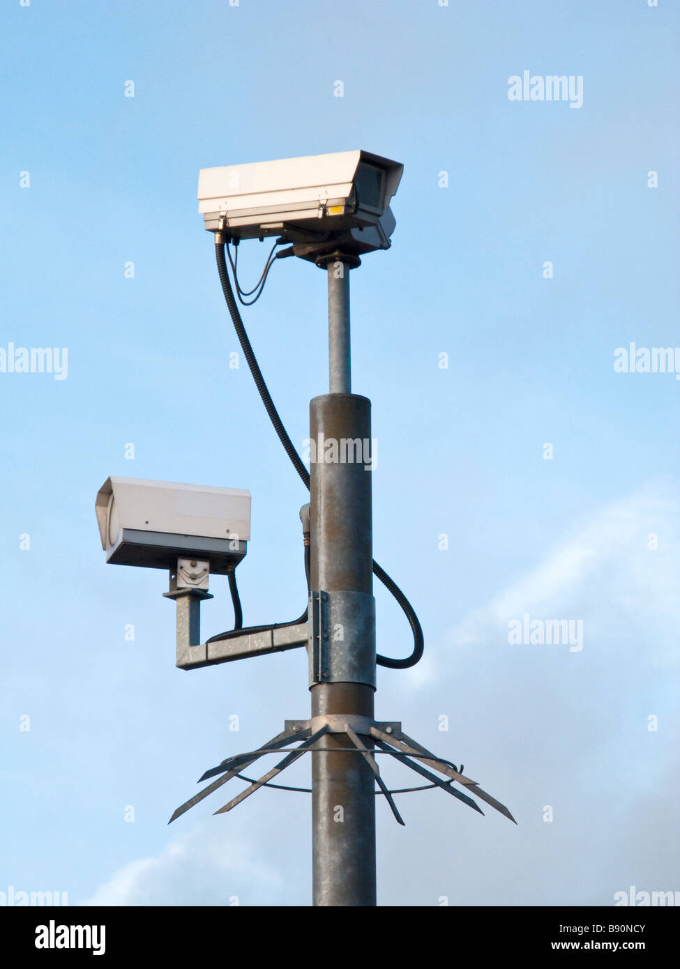 2 security cameras near a railway station Stock Photo - Alamy