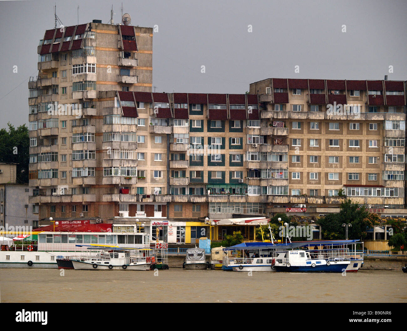 Europe Romania Tulcea apartmentbuildings at the waterfront of the ...