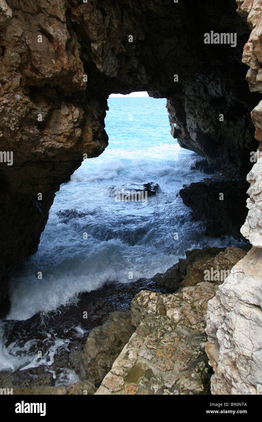 The Cala del Moraig eroded arch at Playa del Moraig, Benitachell, Spain ...