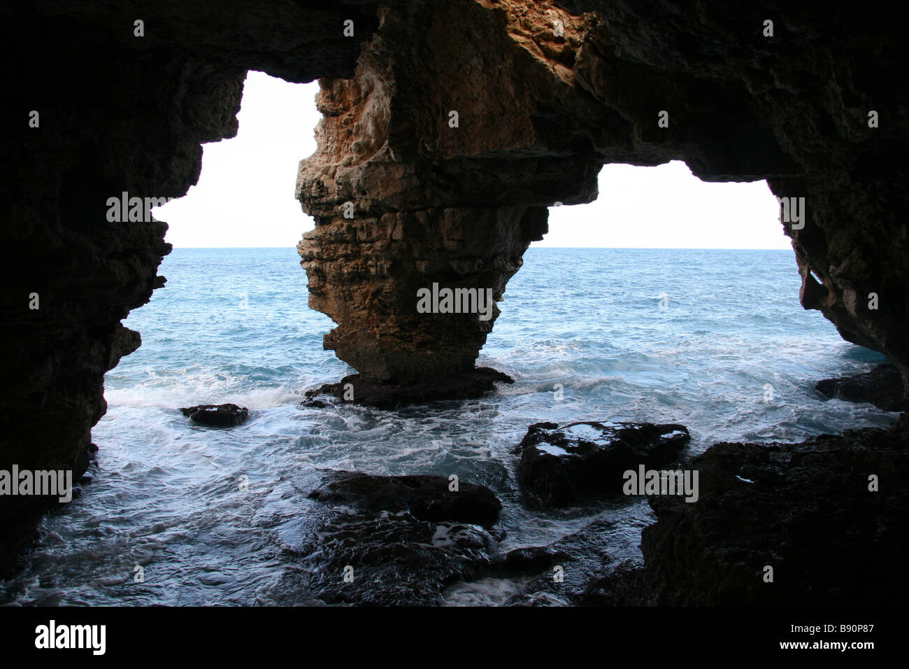 The Cala del Moraig eroded arch at Playa del Moraig, Benitachell, Spain ...