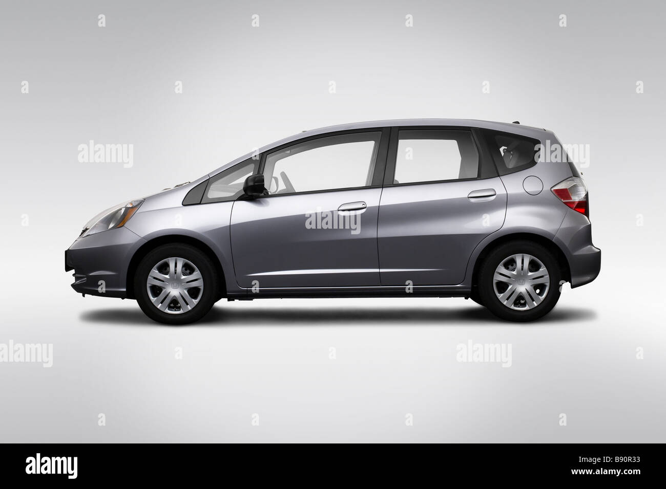 2009 Honda Fit in Silver - Drivers Side Profile Stock Photo - Alamy