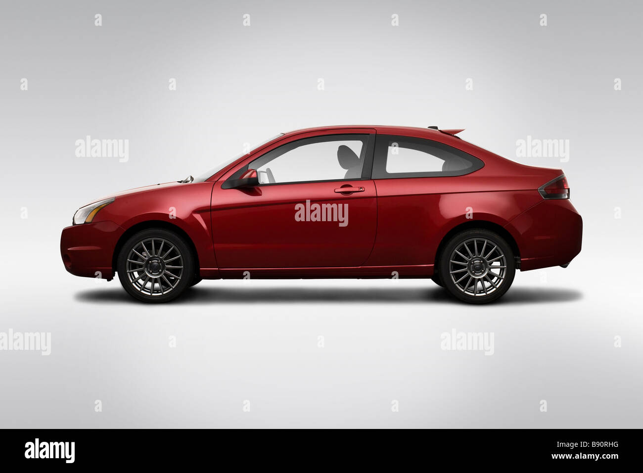 2009 Ford Focus SES in Red - Drivers Side Profile Stock Photo - Alamy