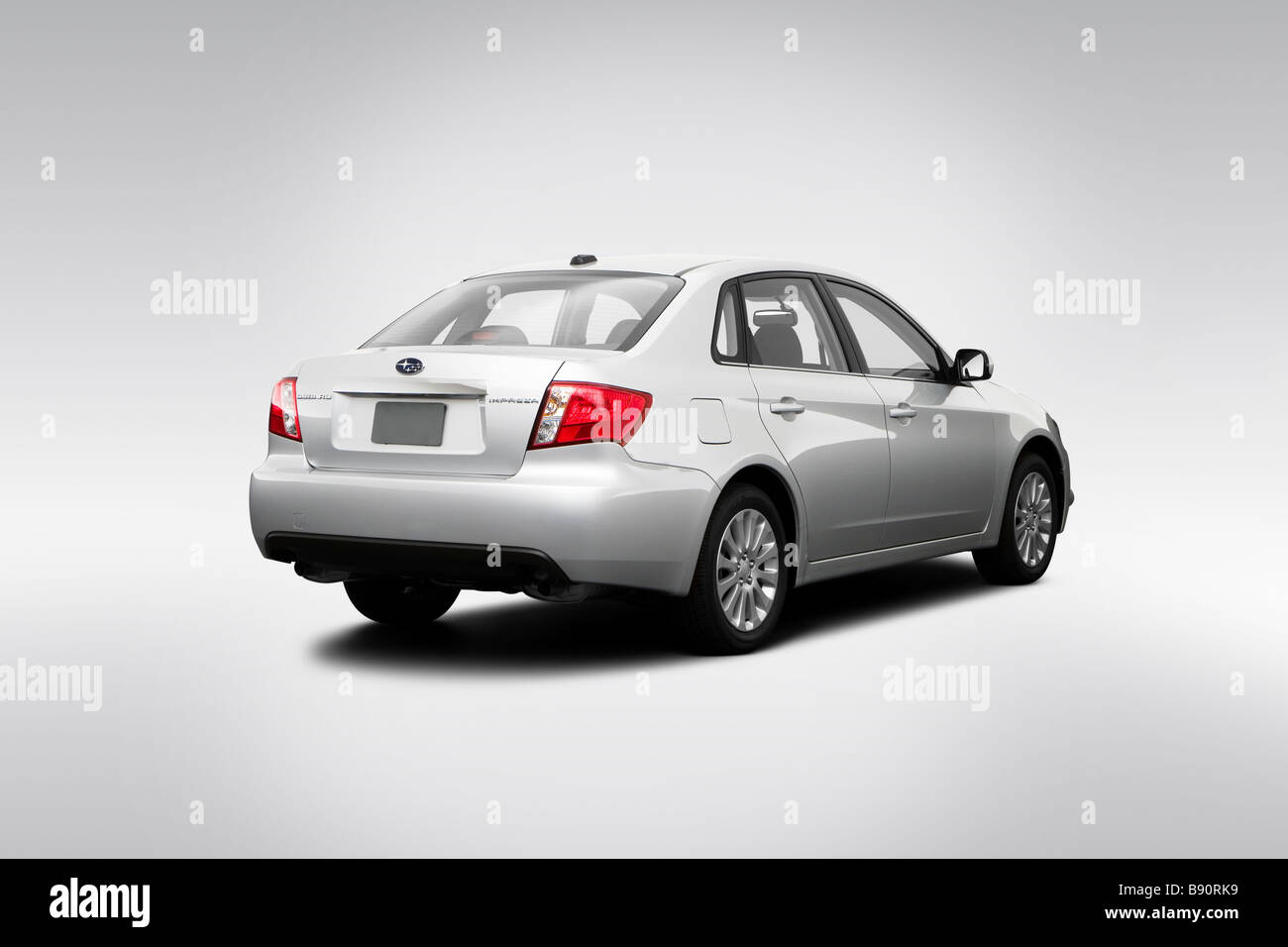 2009 Subaru Impreza 2.5i in Silver - Rear angle view Stock Photo - Alamy