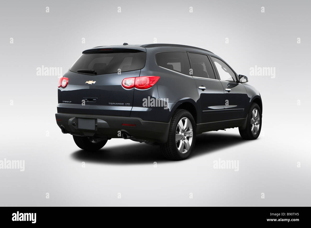 2009 Chevrolet Traverse LTZ in Gray - Rear angle view Stock Photo - Alamy