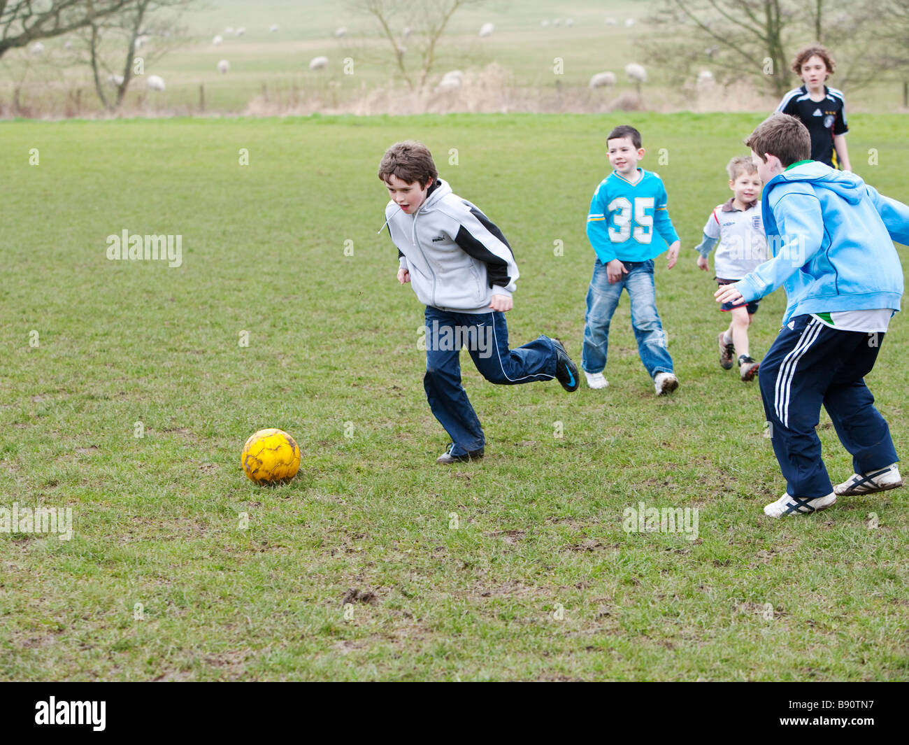 Young Lads Playing Football High Resolution Stock Photography and ...