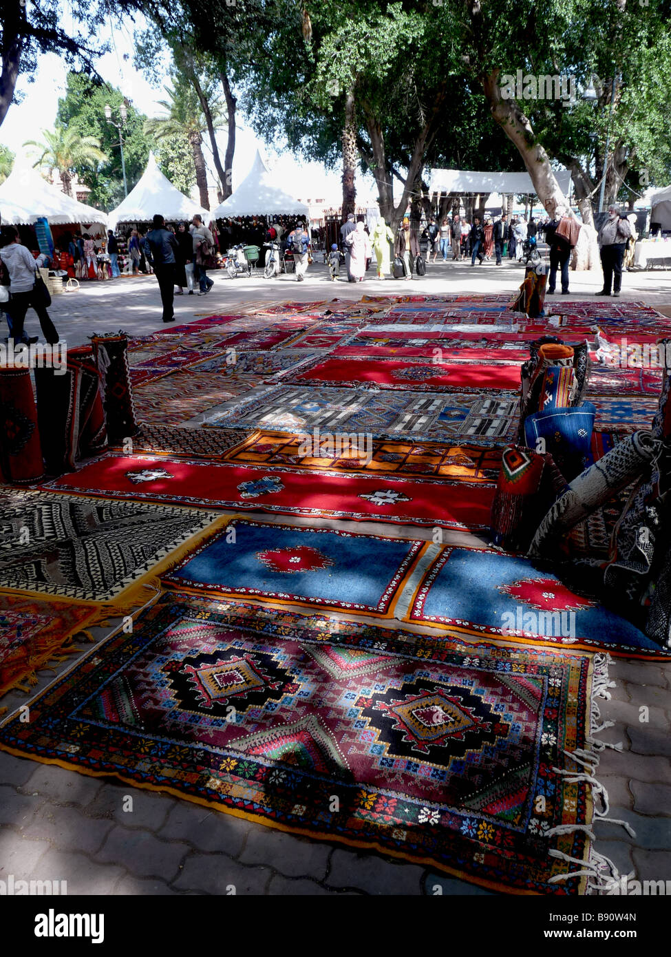 Berber and Arab rugs are displayed in an artisans market in Djma el Fna ...