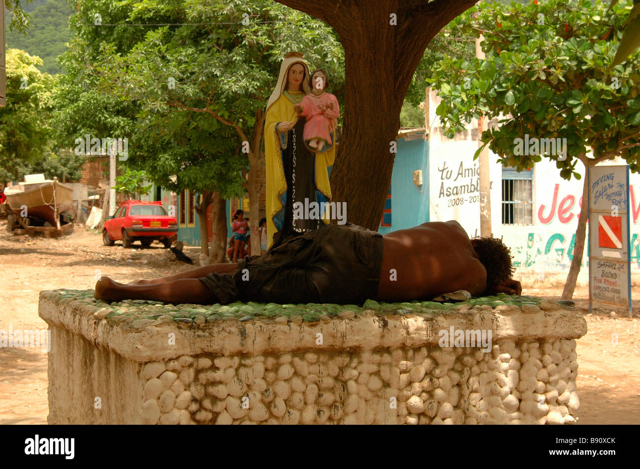 Child poverty beggar faith Taganga Colombia Caribbean coast sleeping ...
